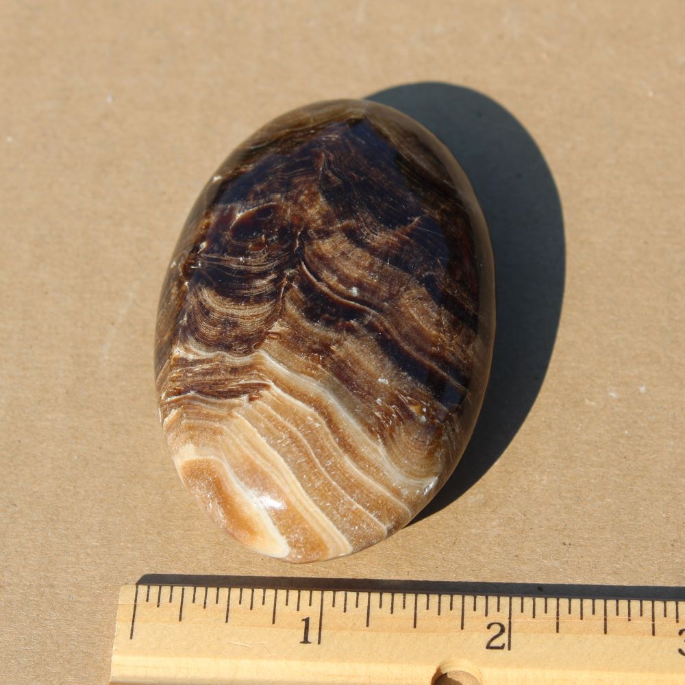 Chocolate Calcite Palm Stone - Bey's Rock Shop